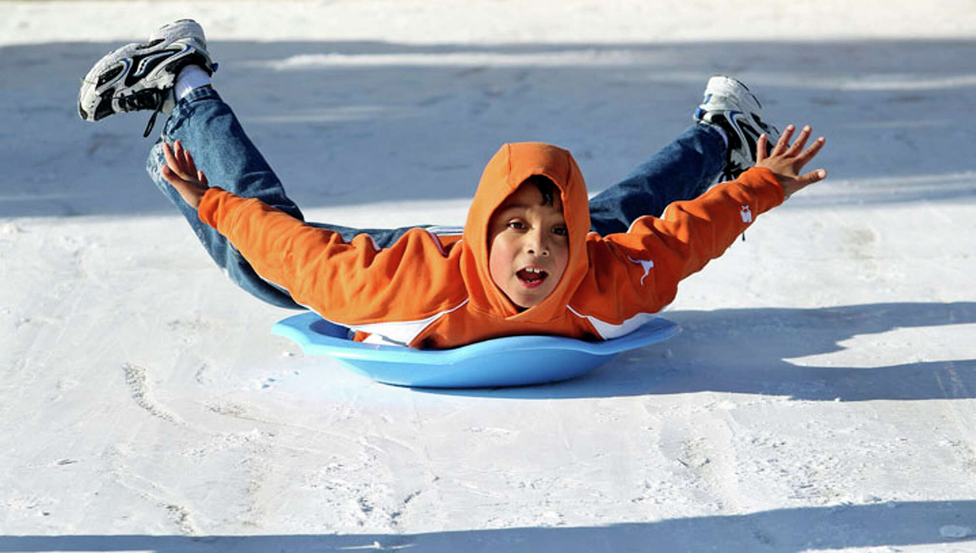 Snow days are rare in San Antonio. Here's a look back in photos.