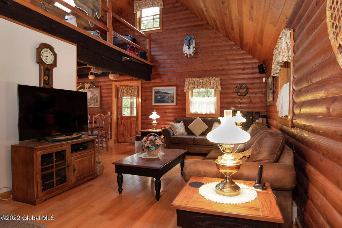 How much does this 1980s Grafton log house cost?