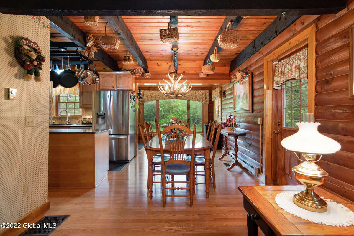 How much does this 1980s Grafton log house cost?