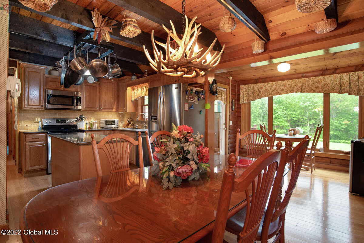How much does this 1980s Grafton log house cost?