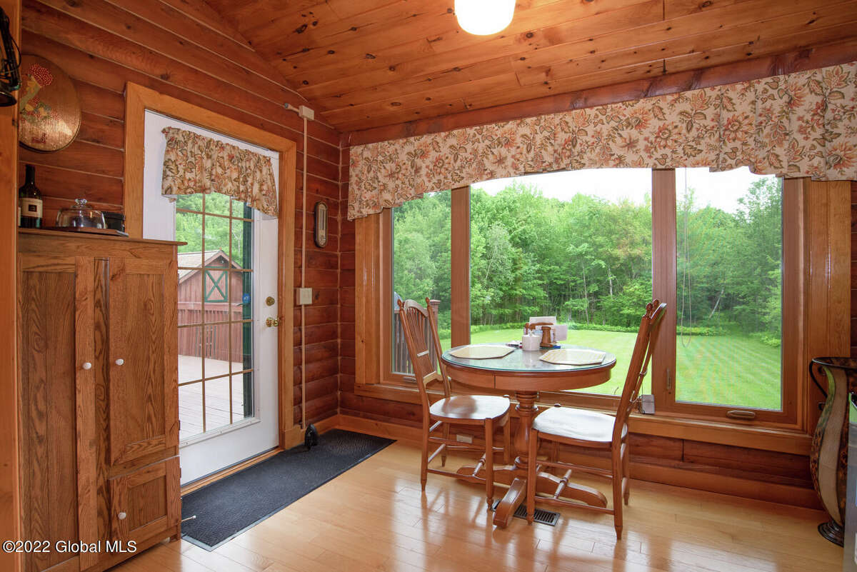 How much does this 1980s Grafton log house cost?