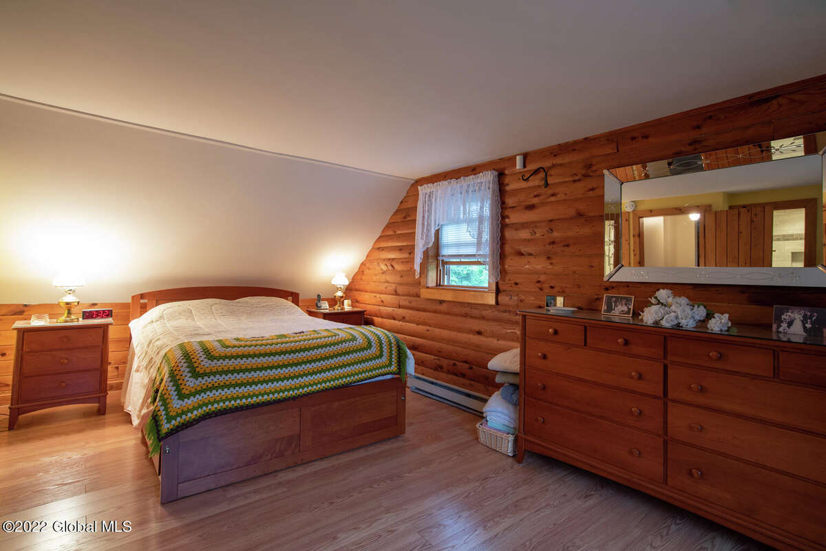 How much does this 1980s Grafton log house cost?