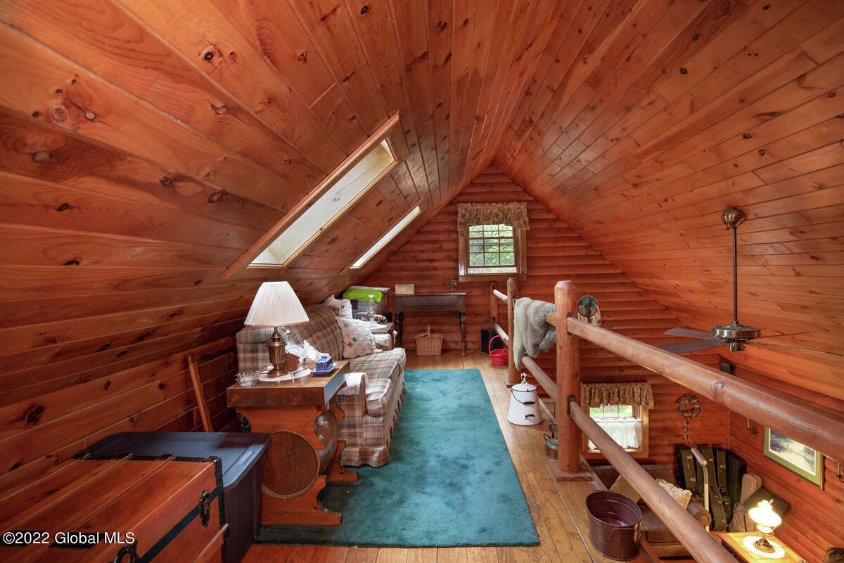 How much does this 1980s Grafton log house cost?