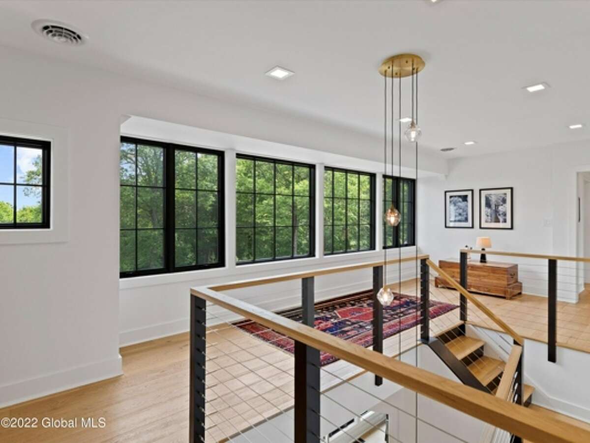 How much does this French Chateau-inspired estate in Greenfield cost?