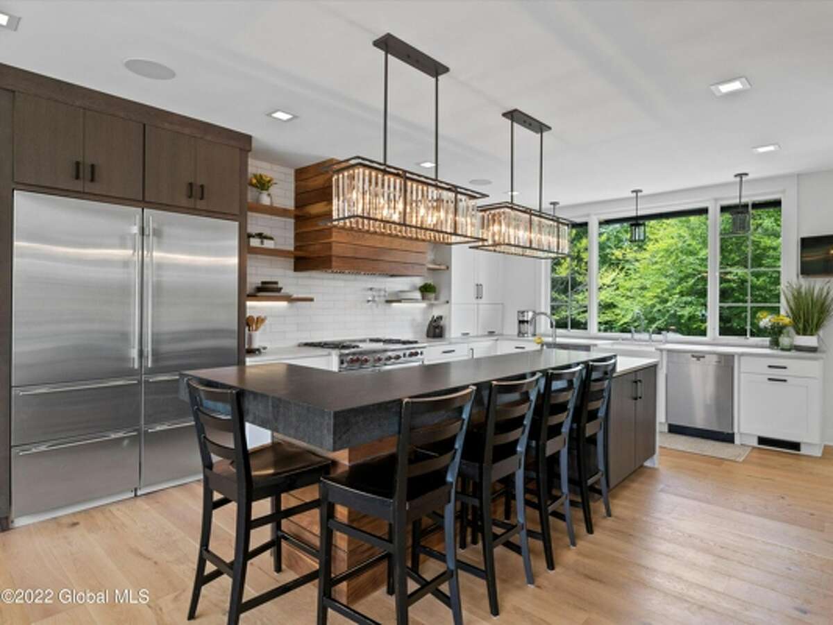 How much does this French Chateau-inspired estate in Greenfield cost?