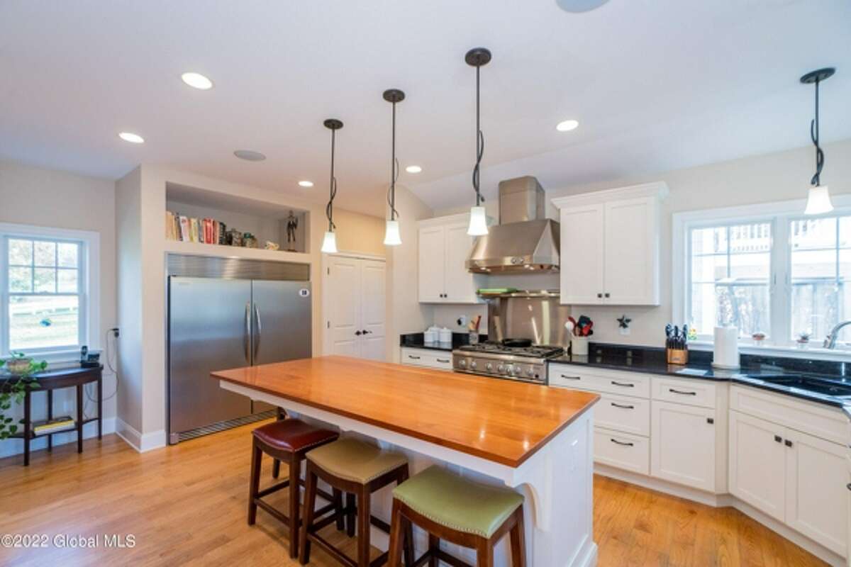 Can you guess the price of this custom, waterfront home in Saratoga?
