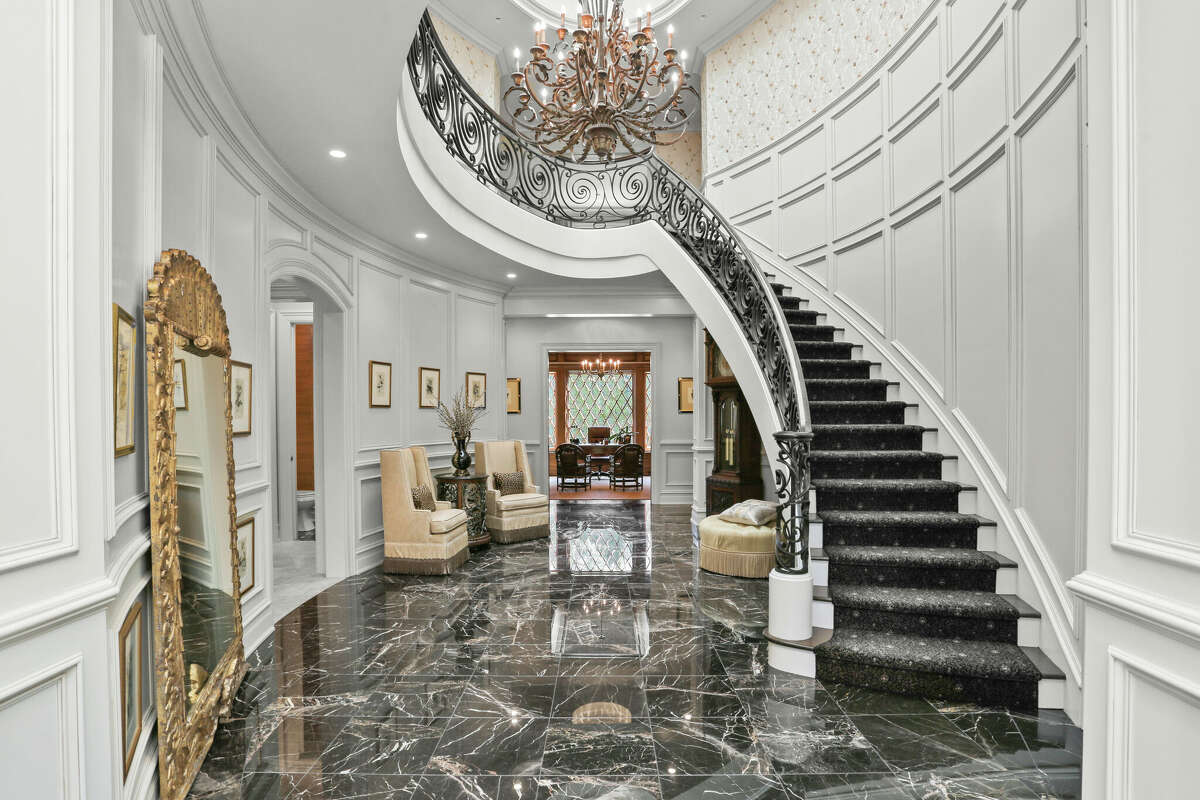 Guess the price of this Greenwich house with a 30-car garage