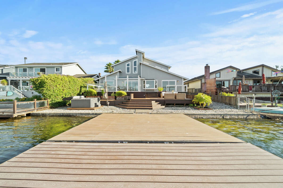 Can you guess how much this waterfront home with a private dock in ...