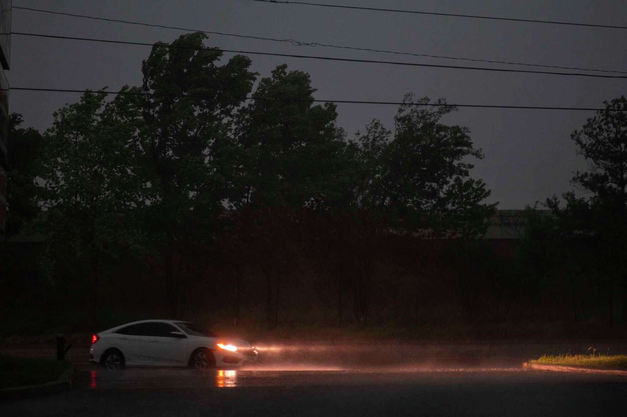 Photos: Houston storm with hurricane-like winds causes destruction
