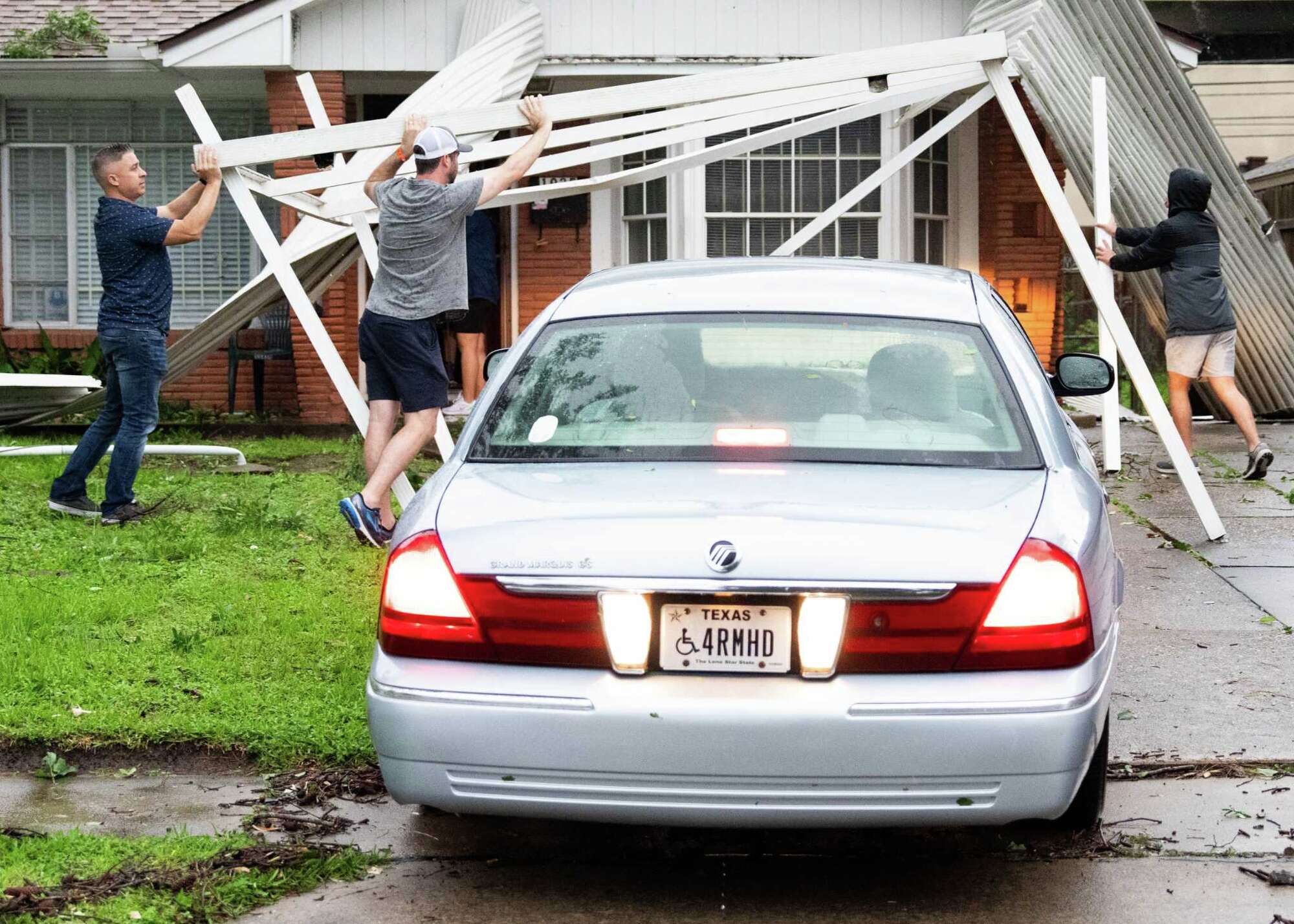 Photos: Houston storm with hurricane-like winds causes destruction