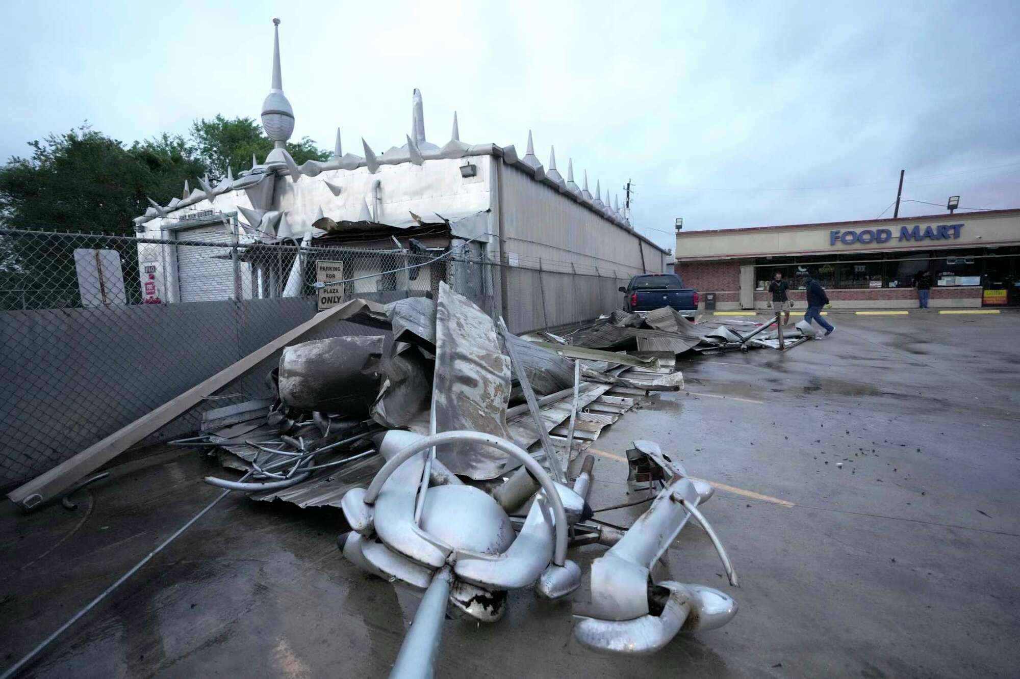 Photos: Houston storm with hurricane-like winds causes destruction