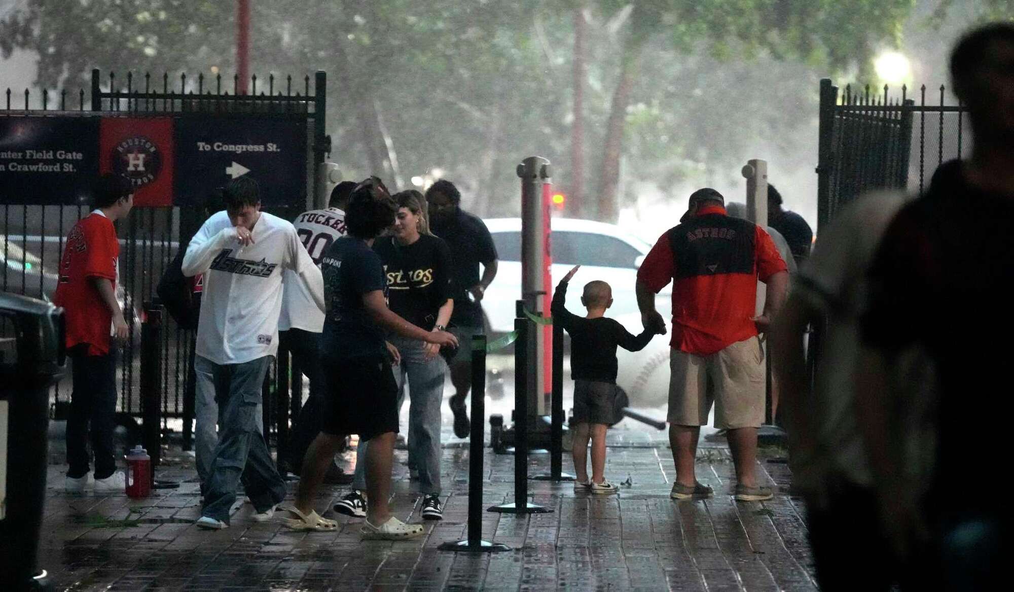 Photos: Houston storm with hurricane-like winds causes destruction