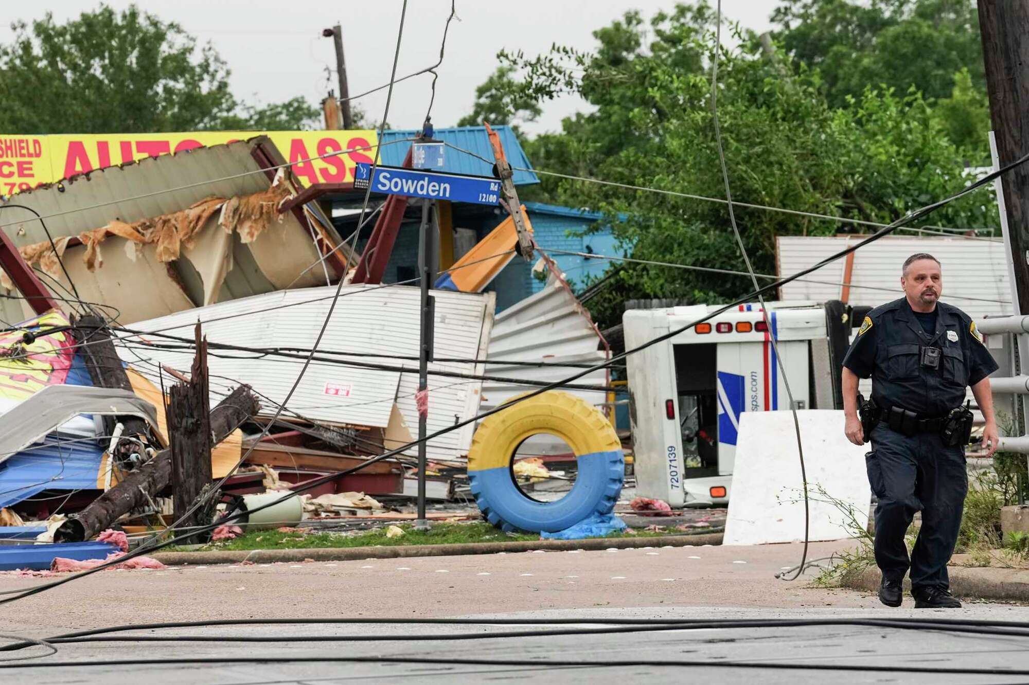 Photos: Houston storm with hurricane-like winds causes destruction