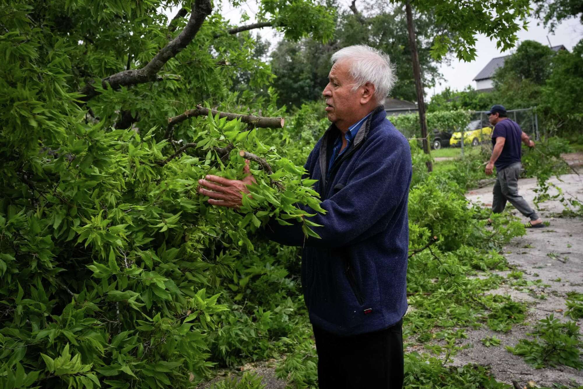Photos: Houston storm with hurricane-like winds causes destruction