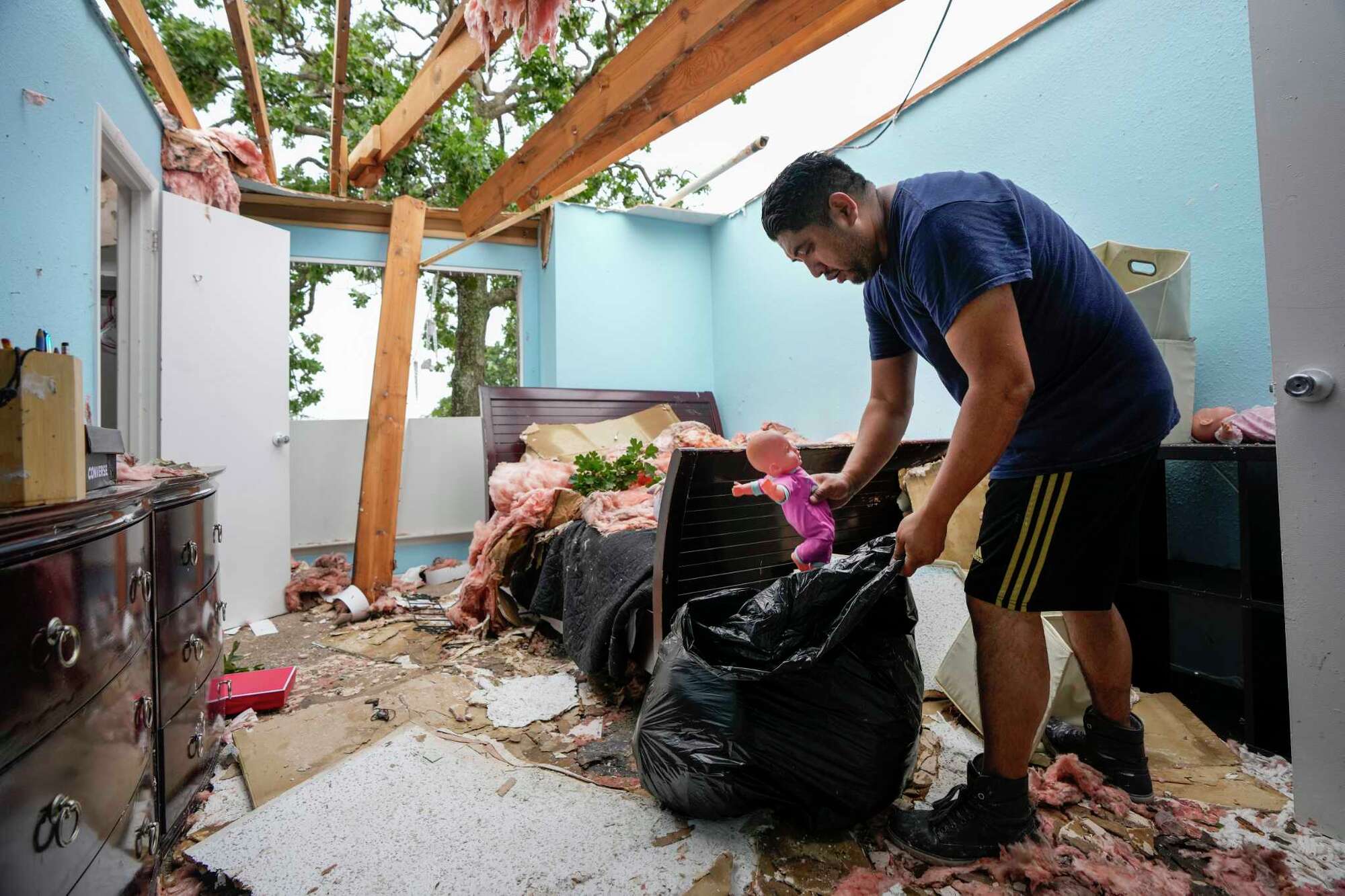 Photos: Houston storm with hurricane-like winds causes destruction