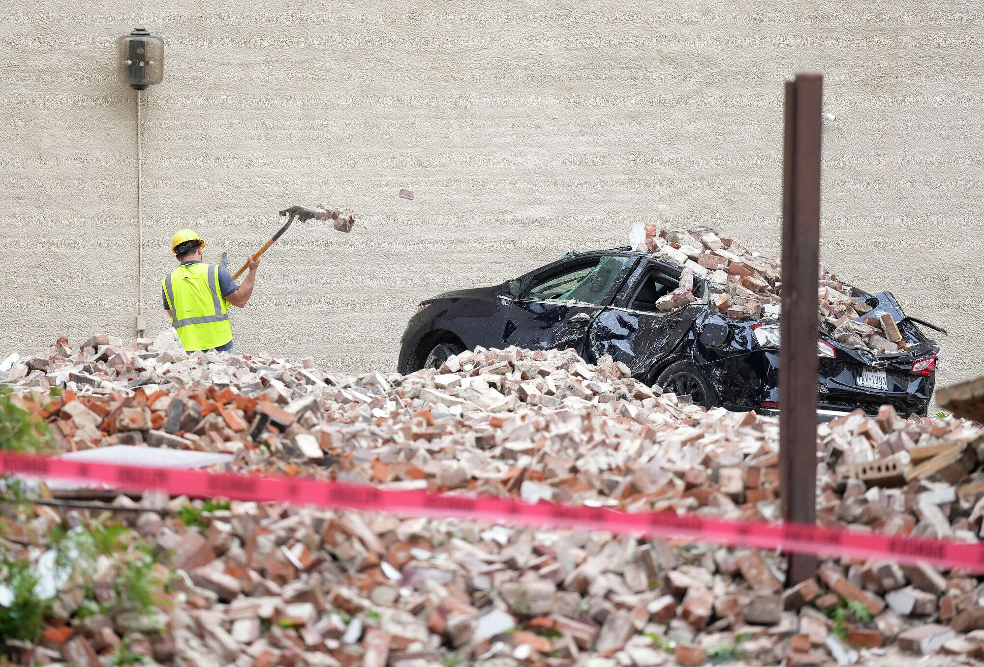Photos: Houston storm with hurricane-like winds causes destruction