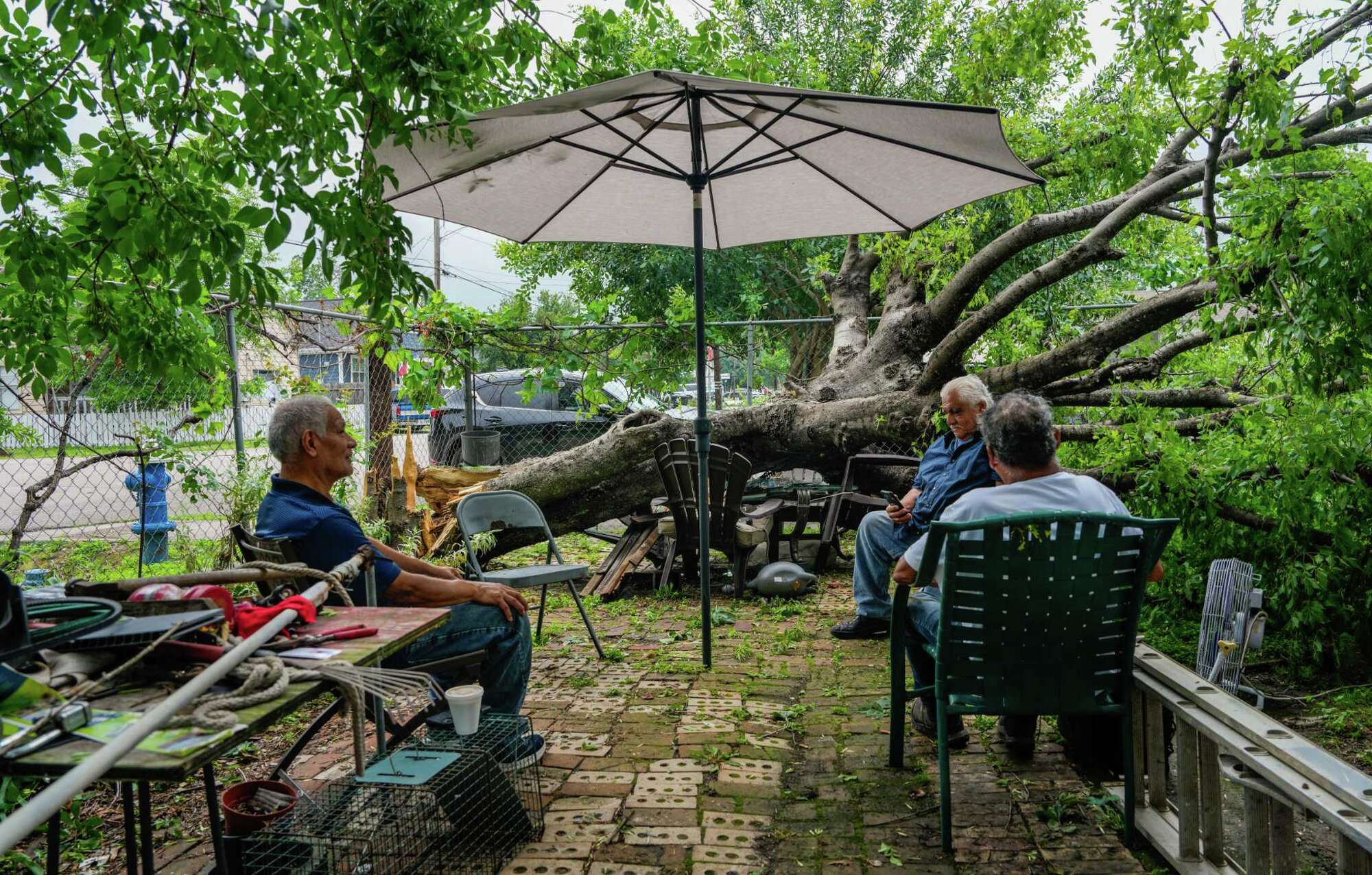 Photos: Houston storm with hurricane-like winds causes destruction