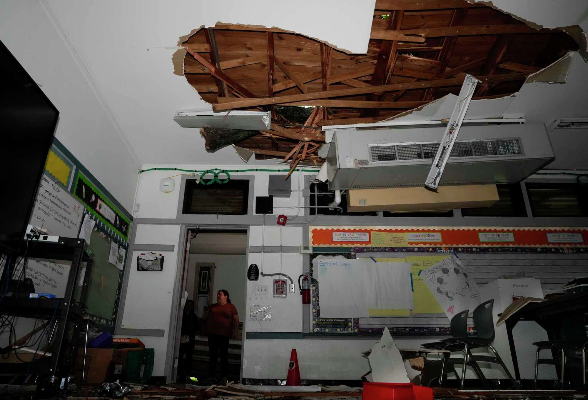 Photos: Houston storm with hurricane-like winds causes destruction