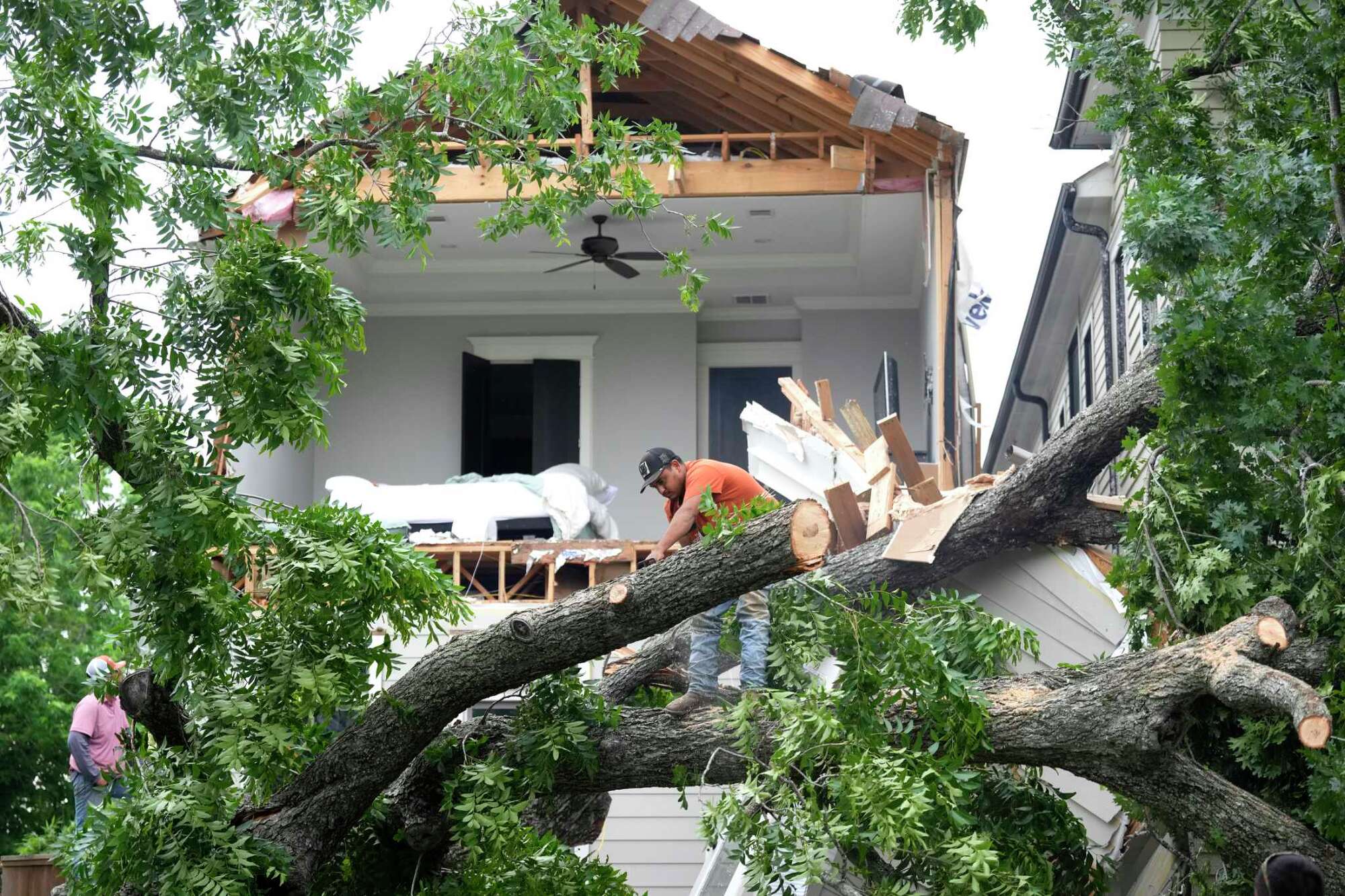 Photos: Houston storm with hurricane-like winds causes destruction
