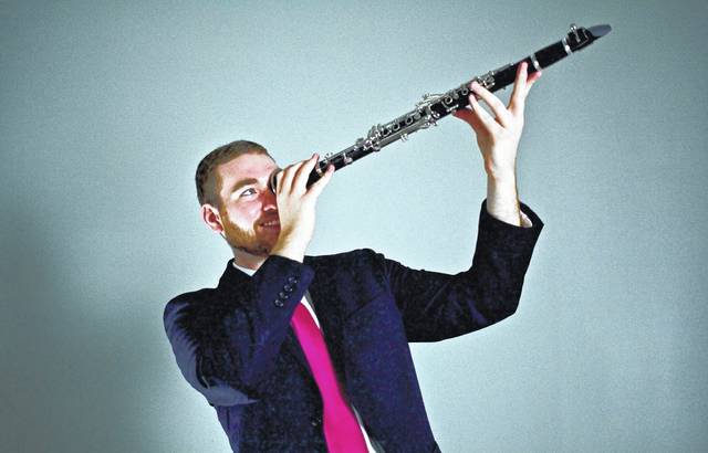 A clarinetist and a pianist walk into a library