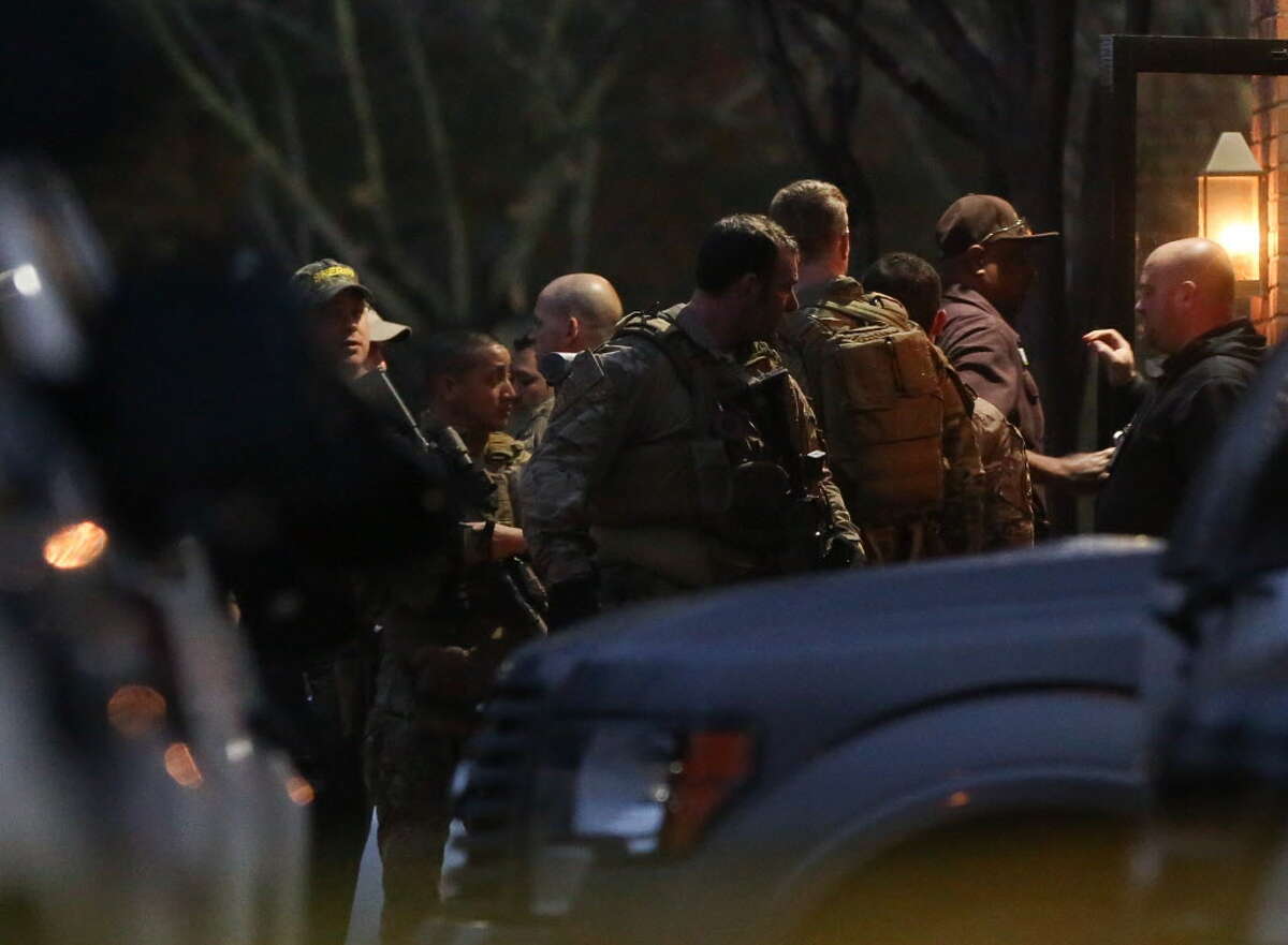 Standoff ends with apparent suicide of man suspected in wife's death