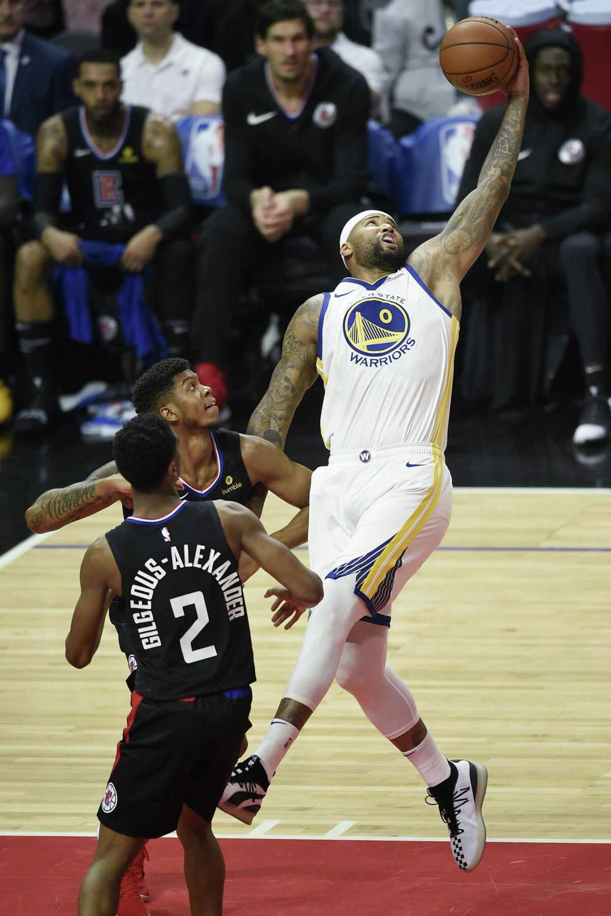 Despite fouling out, Cousins impresses in debut as Warriors beat Clippers
