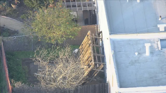 Backyard deck collapse in SF injures two