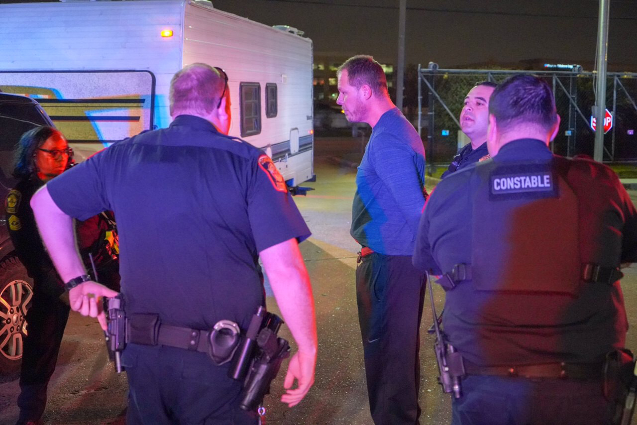 Police arrest man accused of hitting school security guard with car