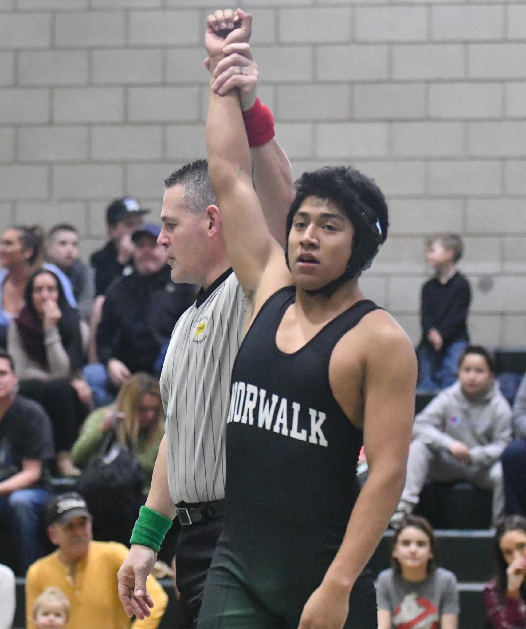 Norwalk wrestling earns historic win over McMahon