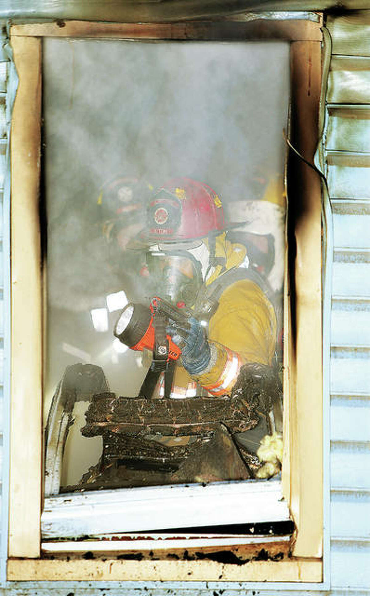 Woman escapes burning house, family reunited after teen feared trapped ...