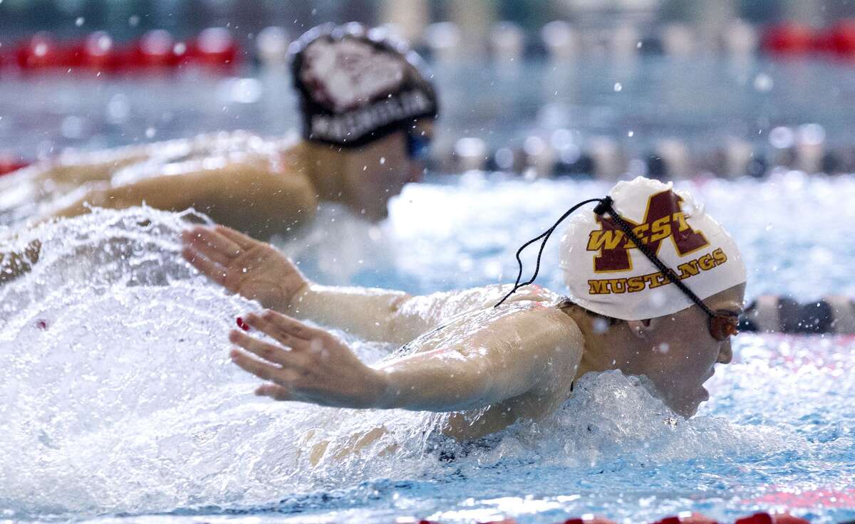 SWIMMING: Magnolia wins pair of district titles in battle with Montgomery