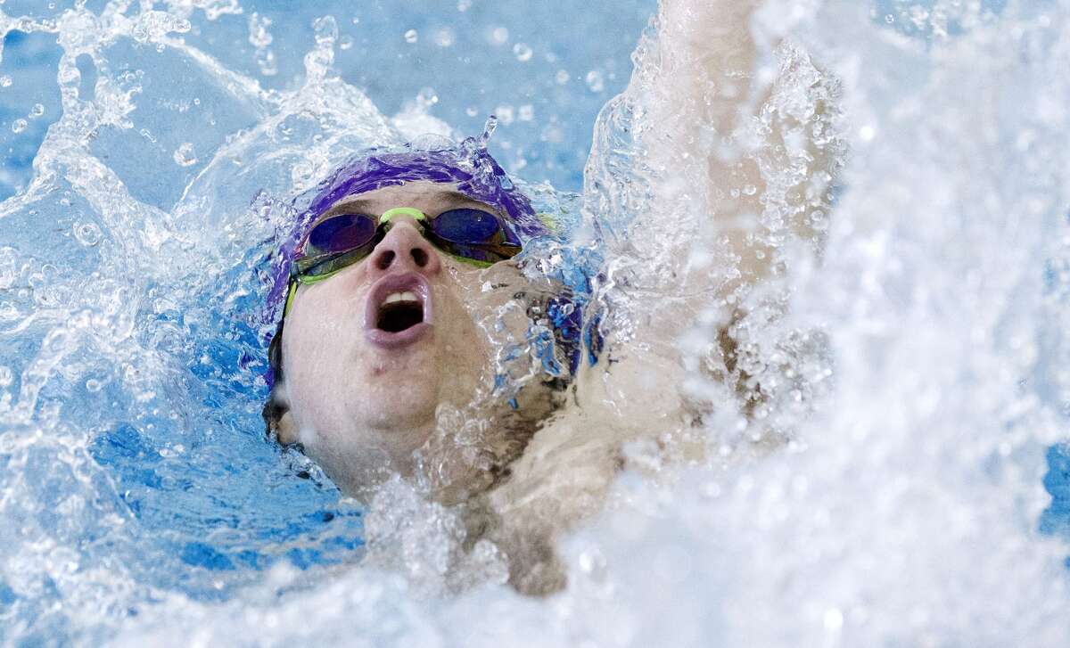 SWIMMING: Magnolia wins pair of district titles in battle with Montgomery