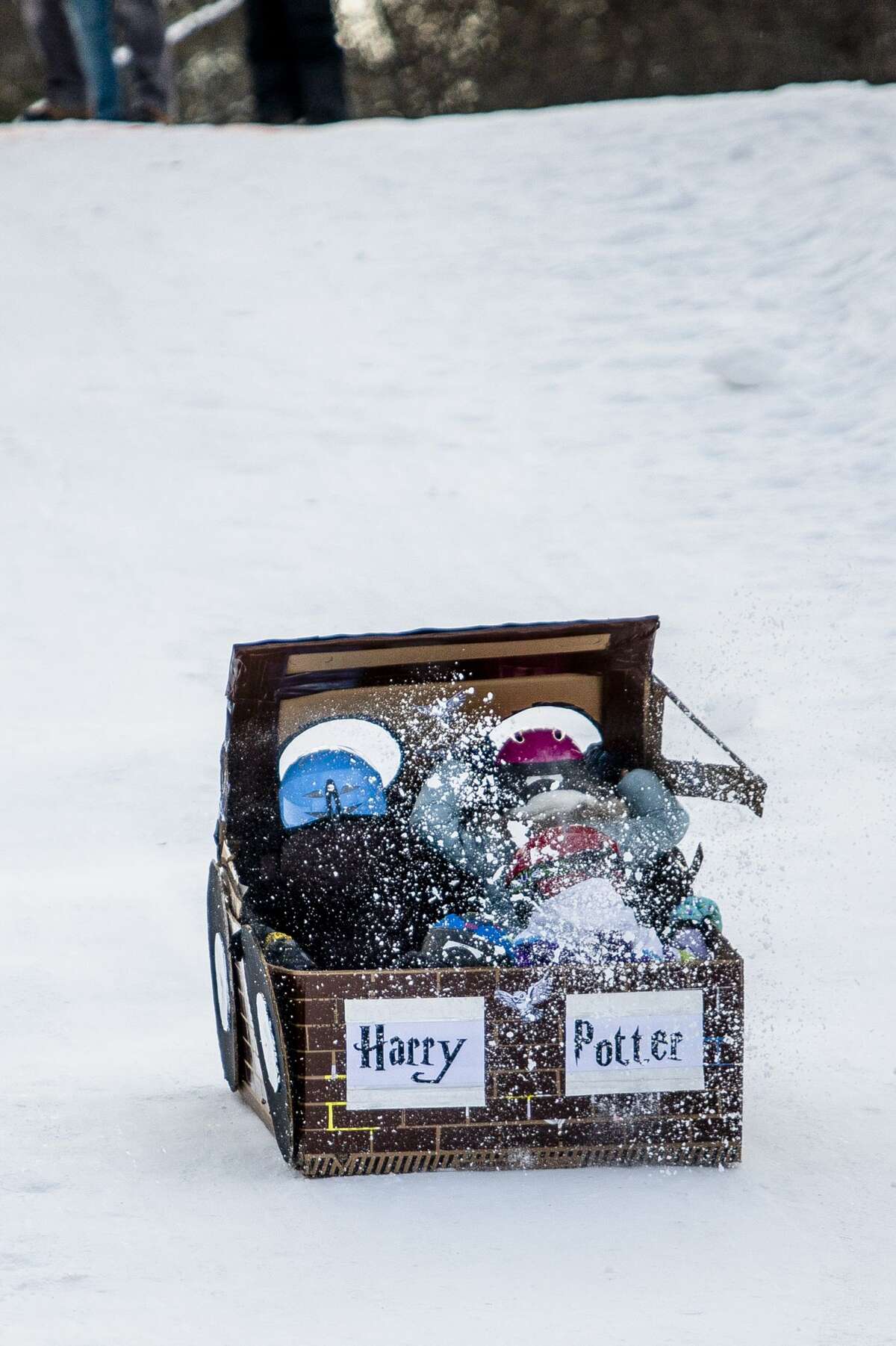 Beat the winter blues with cardboard sled racing at Midland City Forest