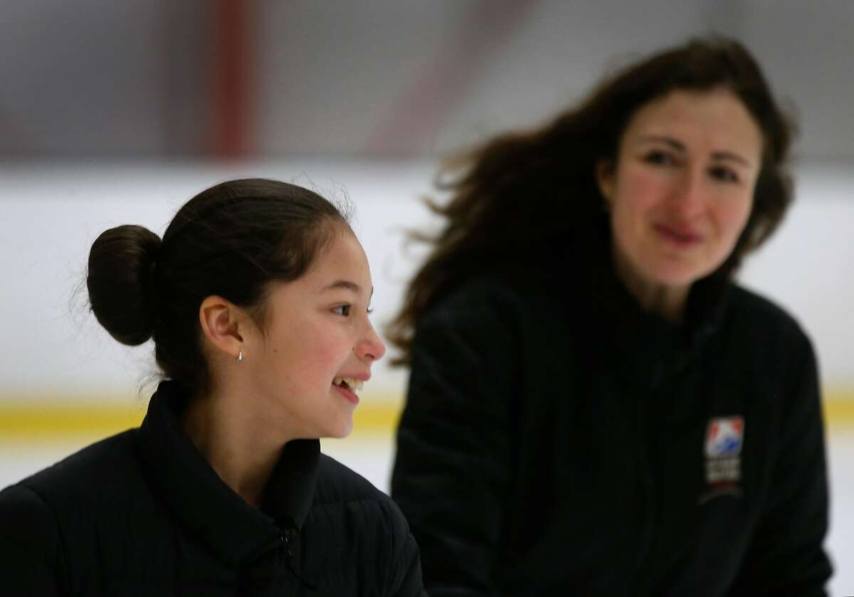 Figure skater Alysa Liu returns home a champion, yet still a kid