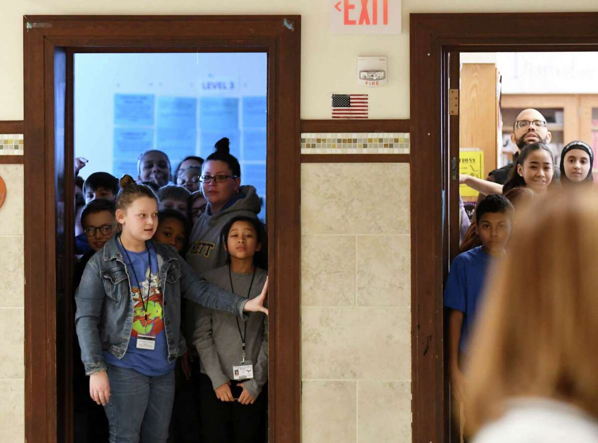 Albany military moms come home to surprise their kids at Hackett middle ...