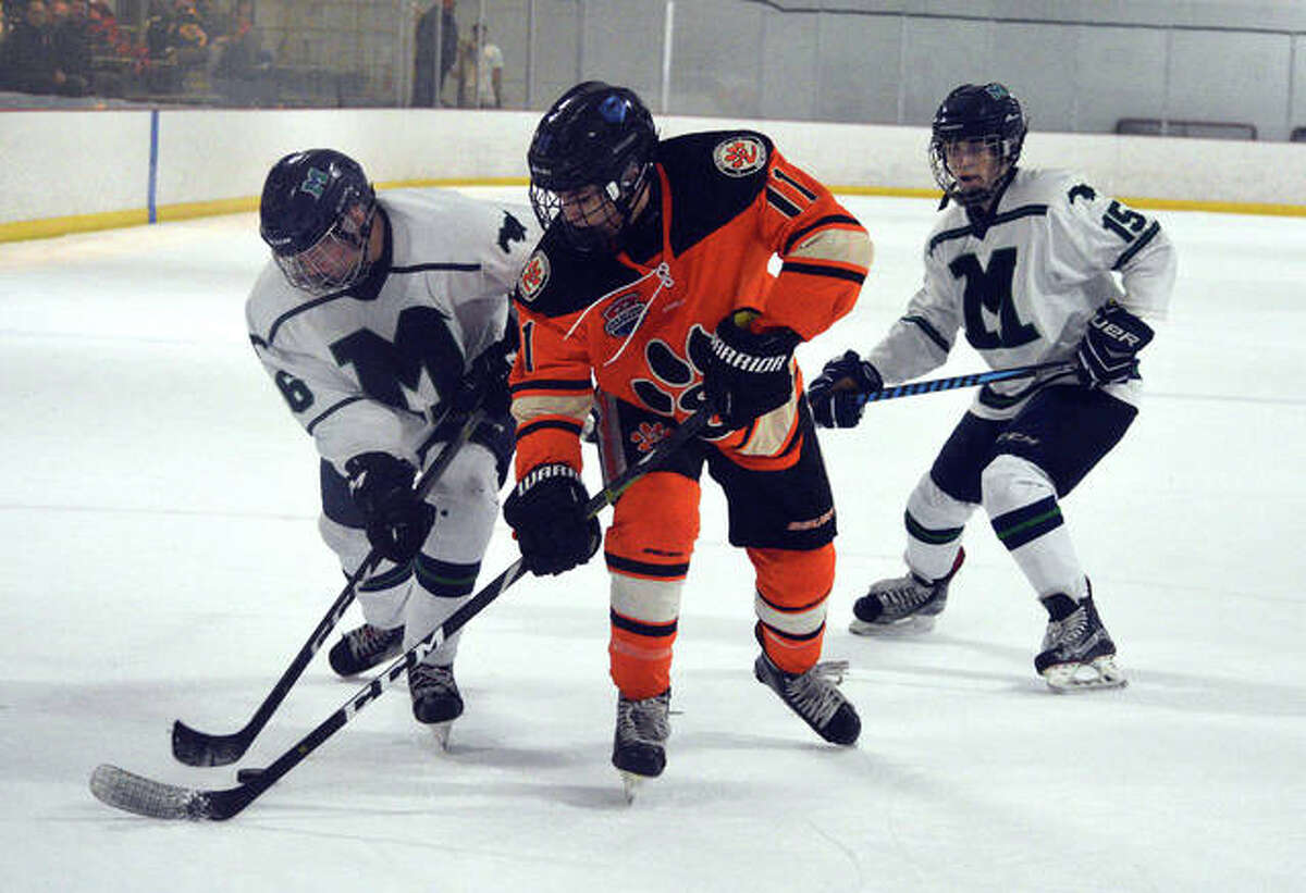 ICE HOCKEY: Marquette holds on to beat Edwardsville (87 photos)