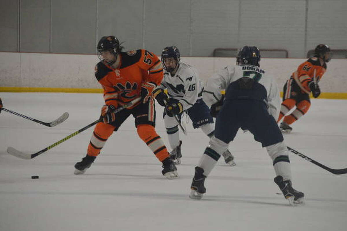 ICE HOCKEY: Marquette holds on to beat Edwardsville (87 photos)