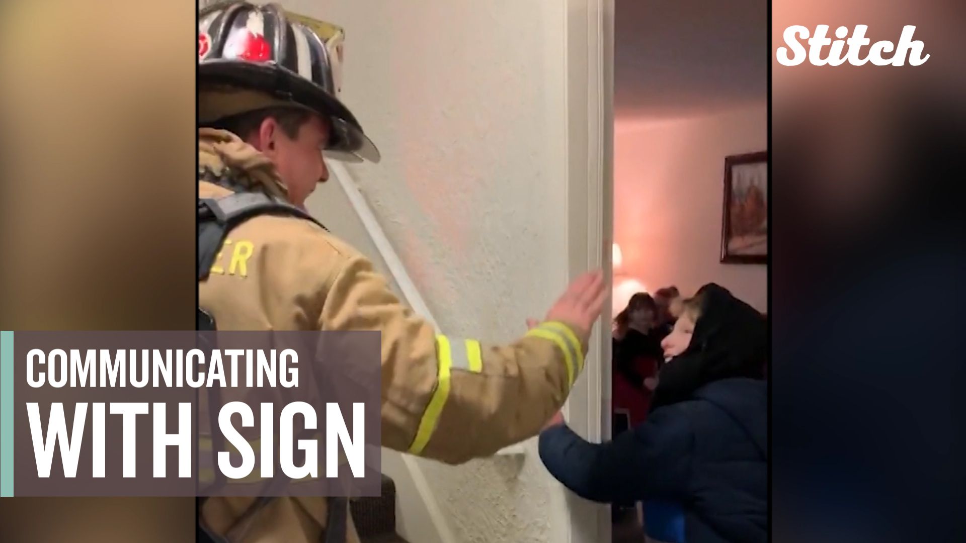Firefighter uses sign language to communicate with boy with cerebral palsy