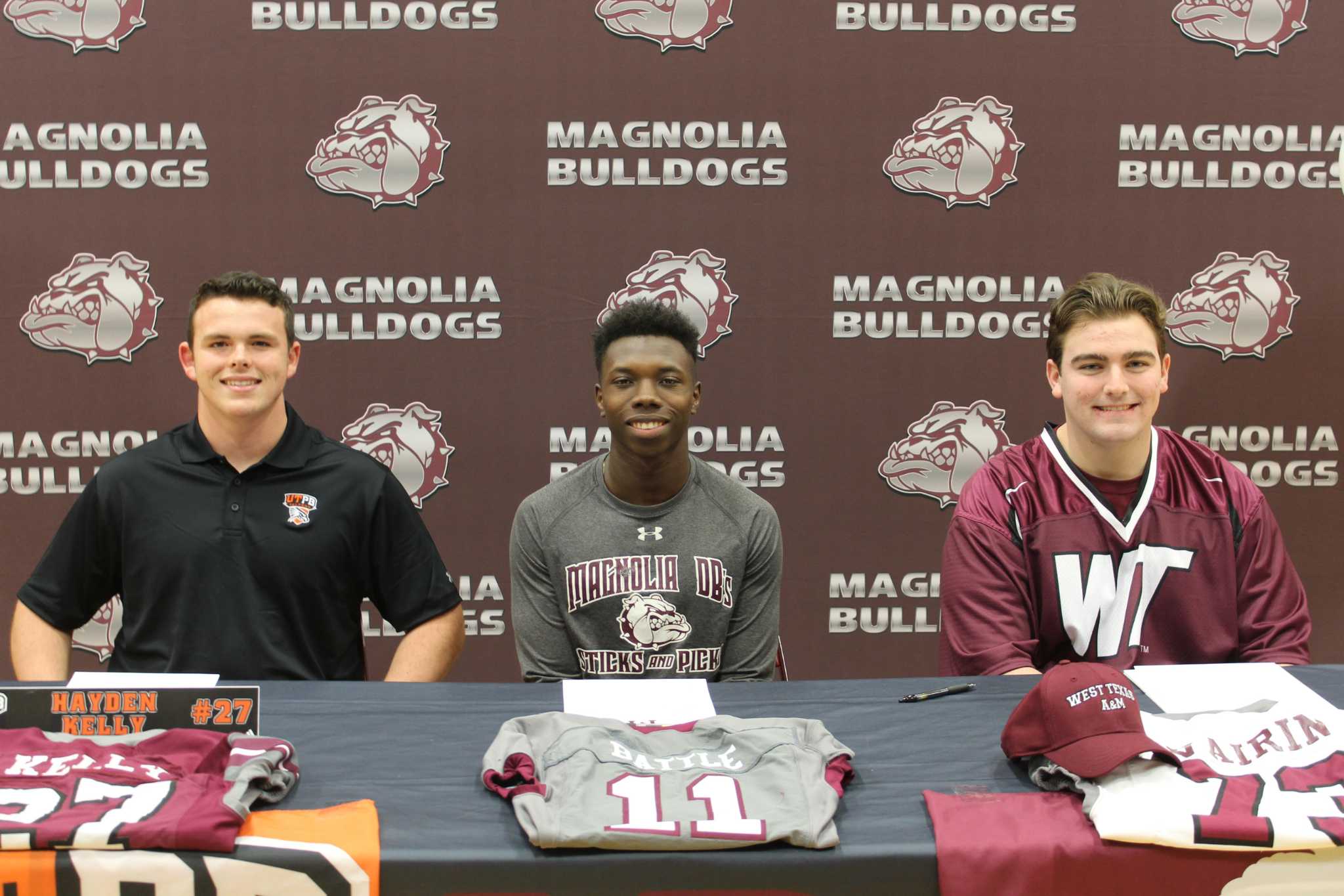 SIGNING DAY: Trio of football players sign at Magnolia