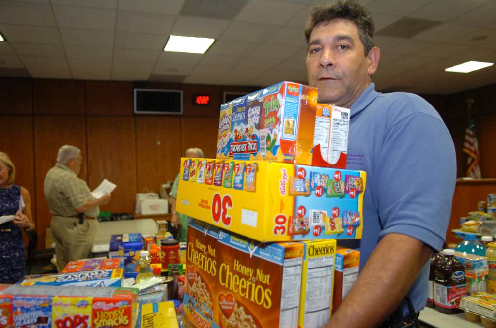 Town employees' food drive restocks pantries