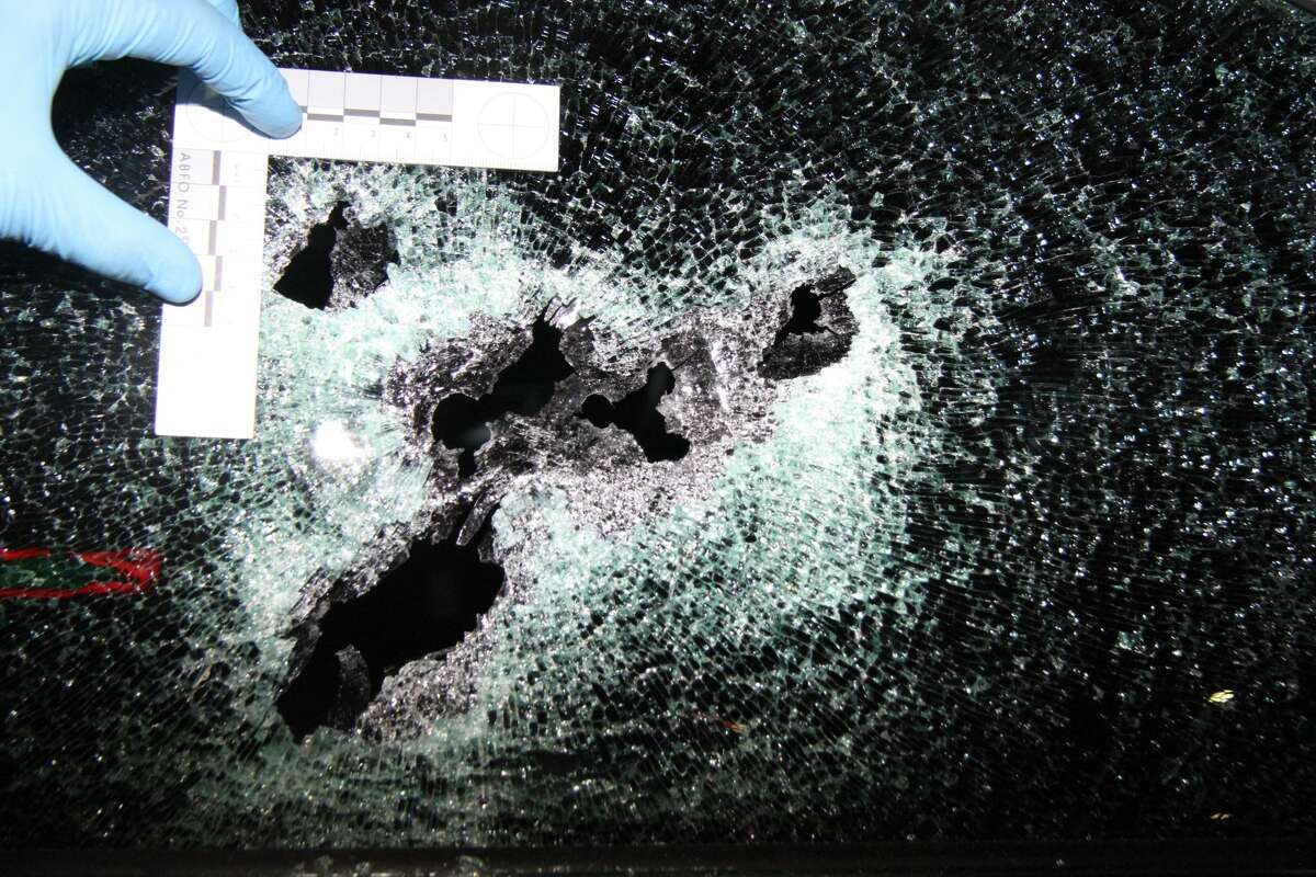 Graphic crime scene photos show aftermath of gun battle outside strip ...