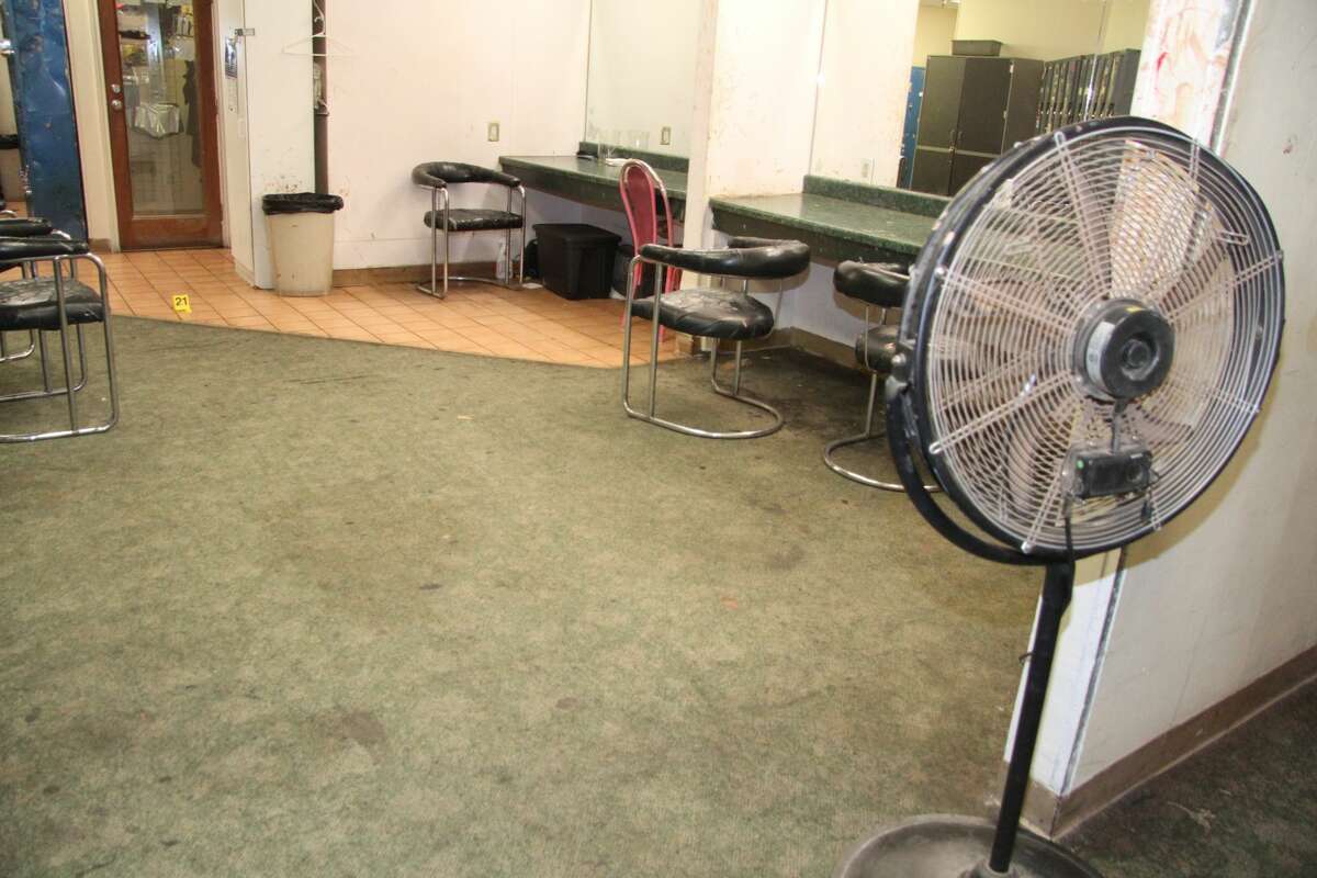 Graphic crime scene photos show aftermath of gun battle outside strip ...