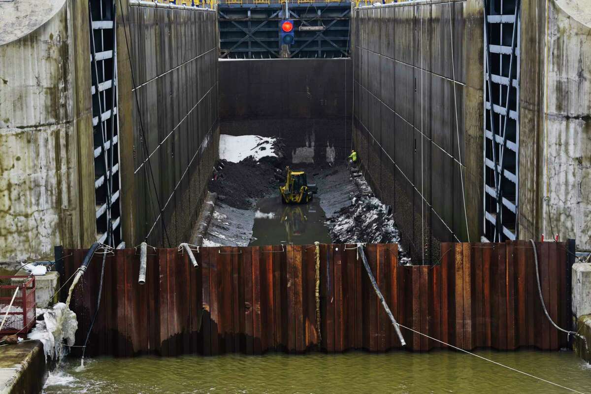 Workers give canal lock a big lift