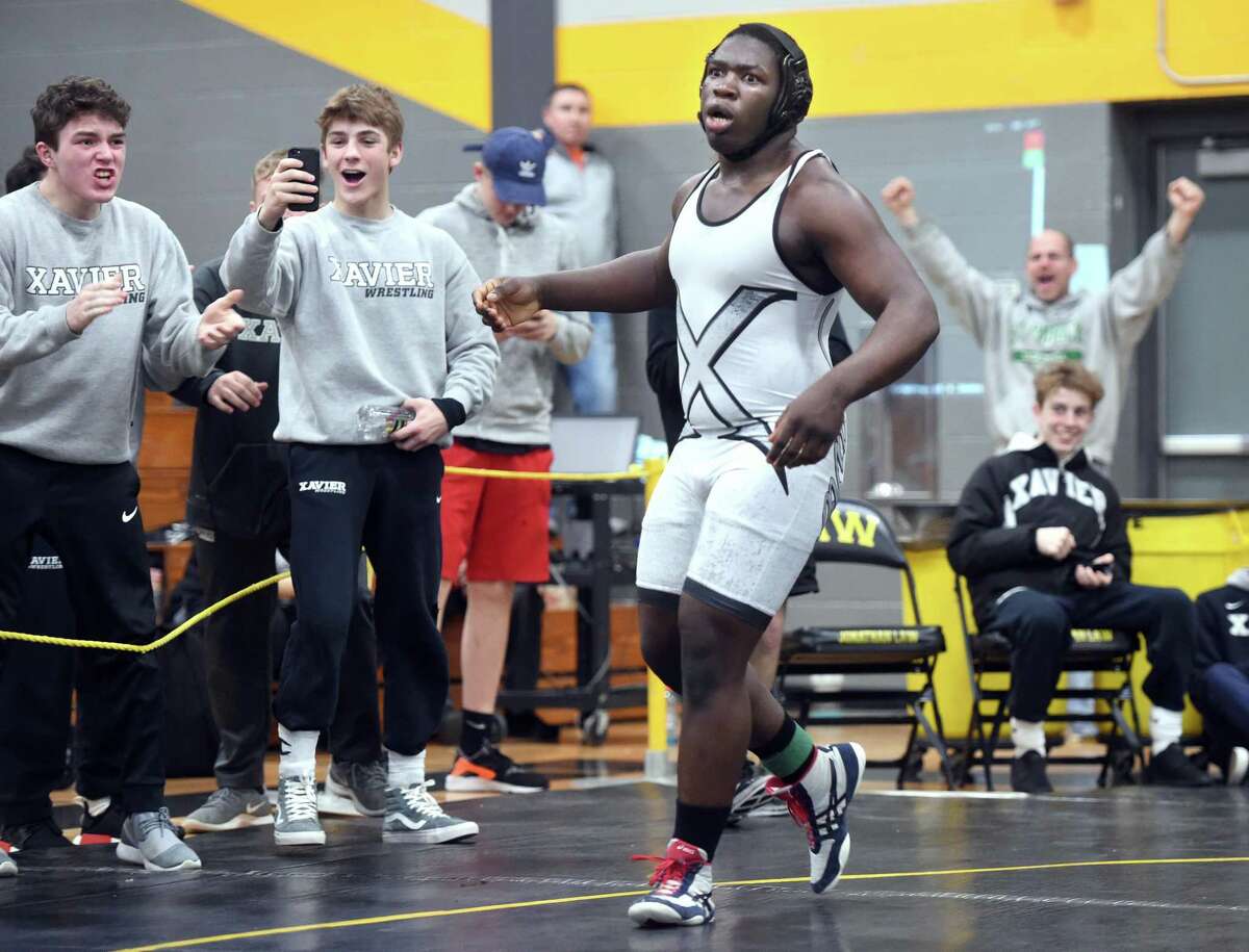 Xavier wrestlers dominate, make it a three-peat at SCC championship