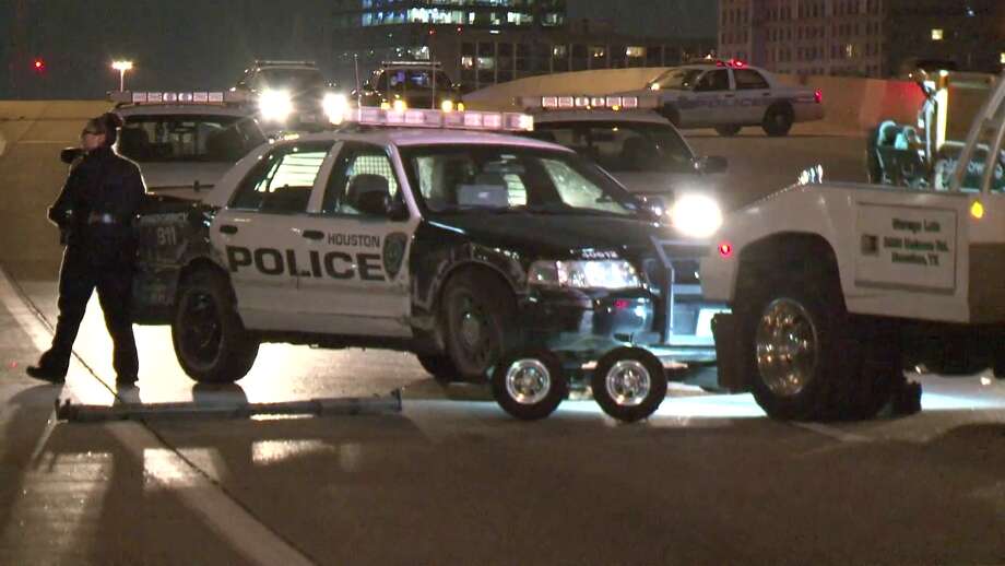Houston police officer injured when car hits barricade on 610 - Houston ...