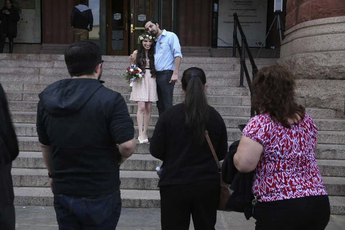 San Antonio tradition of mass Valentine’s Day weddings on courthouse steps continues