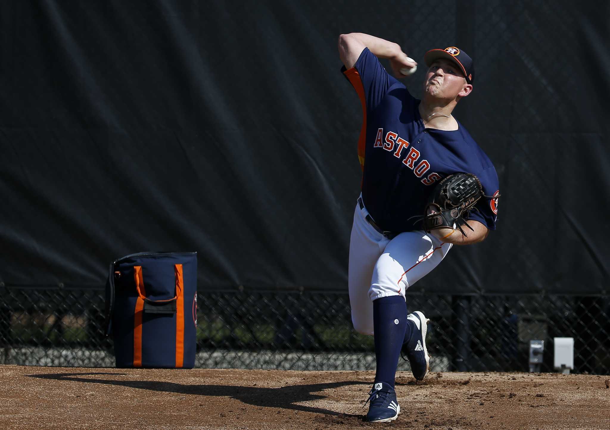 Astros' Will Harris makes spring debut after painful offseason