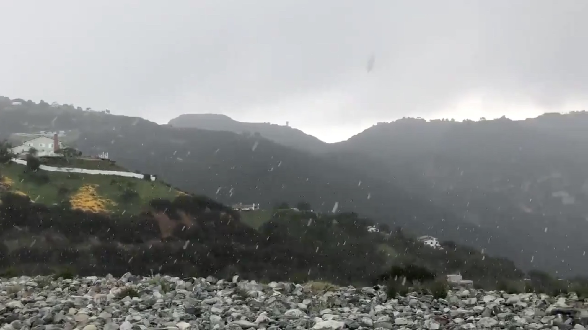 Rare snow falls in Malibu, only miles from the beach