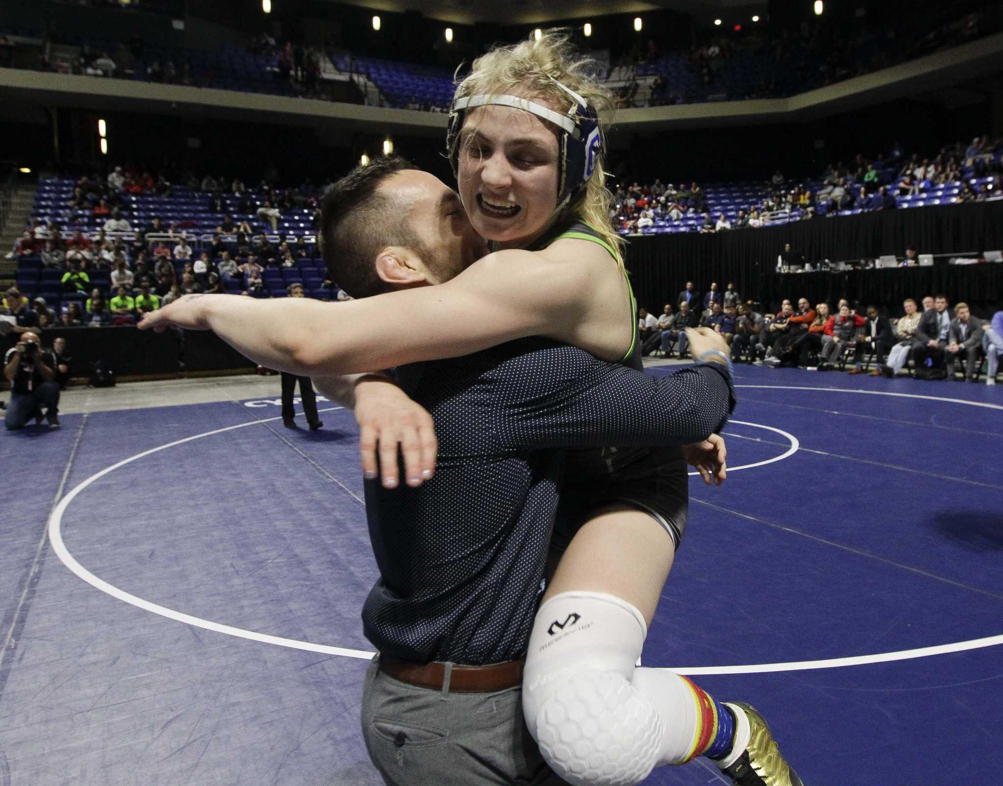 WRESTLING: Robinson finishes career with gold at state