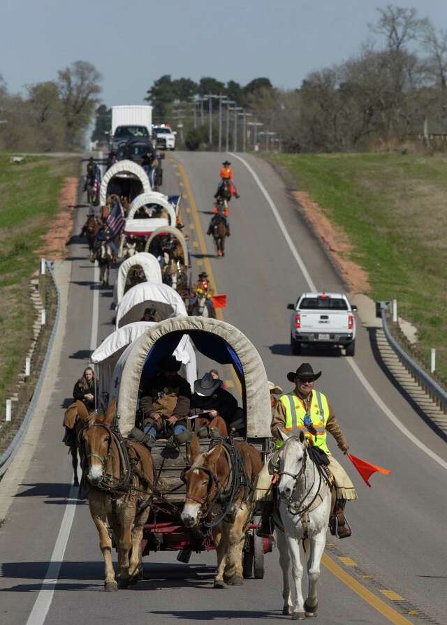 Six days in a covered wagon: The ride into Houston for the rodeo ...